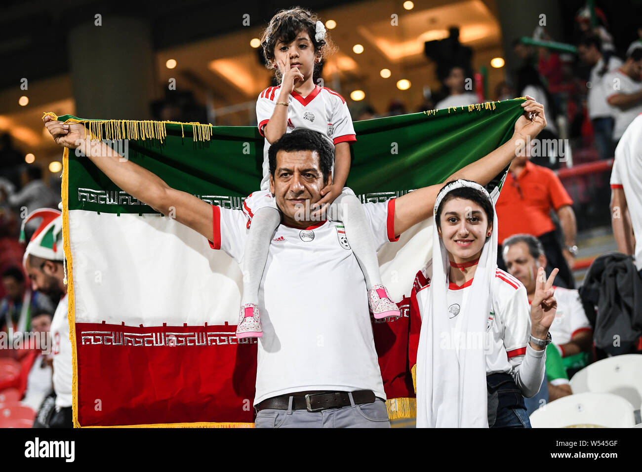 Iran fans wave slogans and national flags to show support to Iran ...
