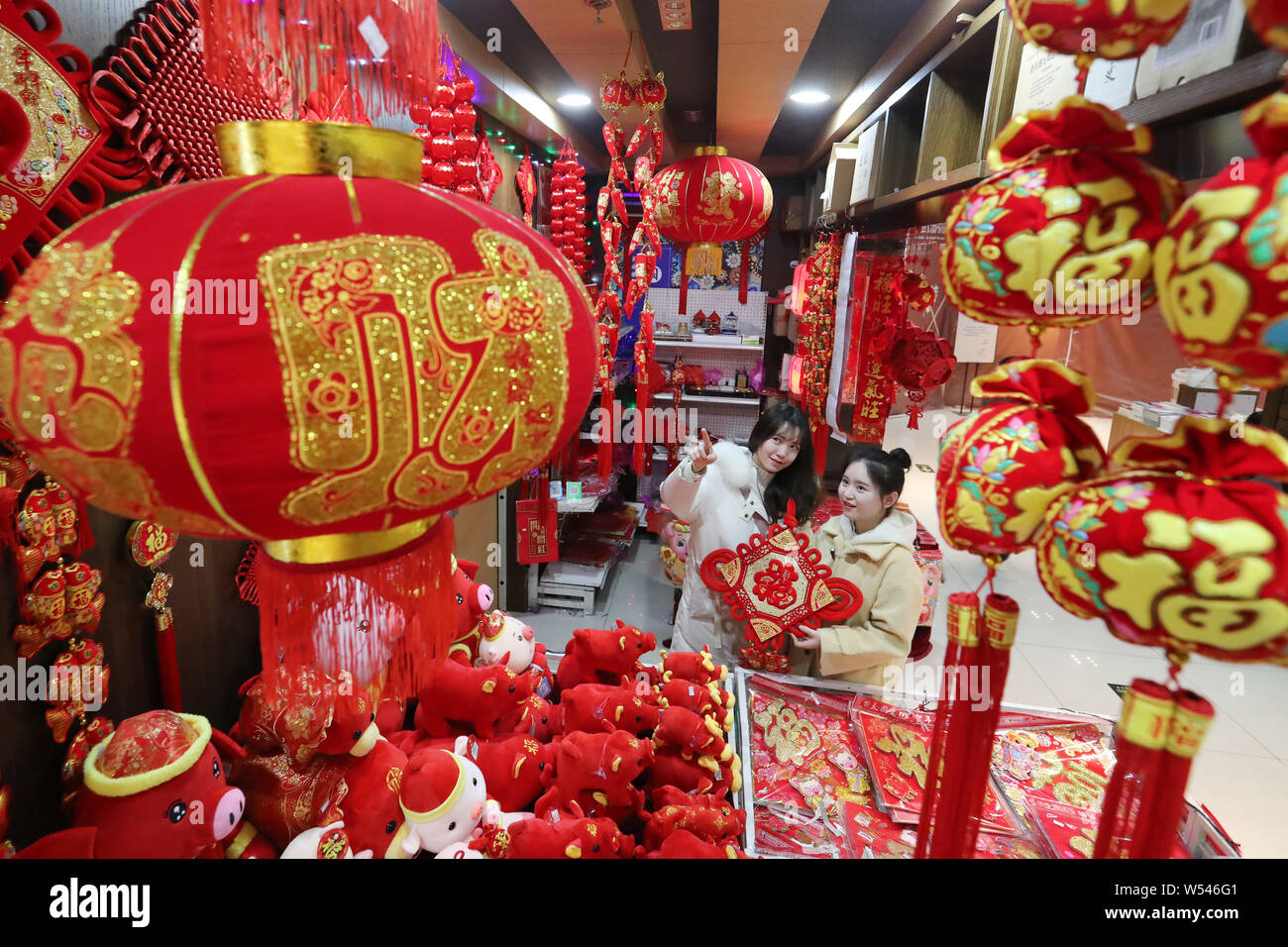 Local Chinese residents shop for red lanterns and decorations for the ...