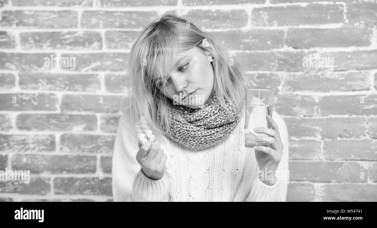 Woman taking vitamin tablets Black and White Stock Photos & Images - Alamy