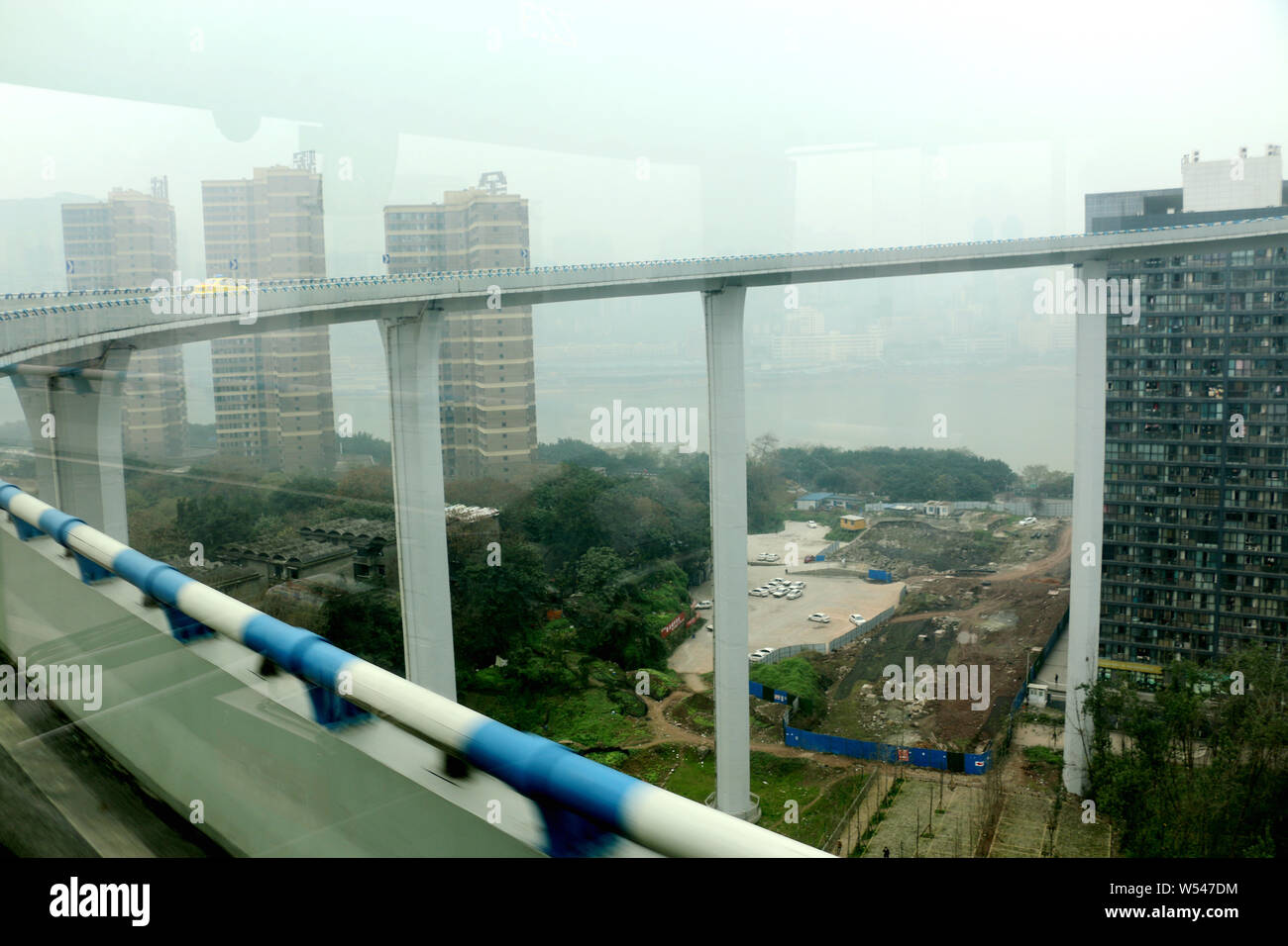 Cars drive on China's tallest highway interchange, Sujiaba Interchange ...