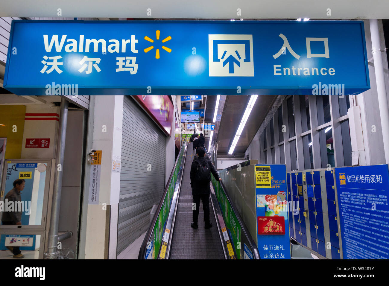 --FILE--Customers shop at a supermarket of Walmart in Shanghai, China ...