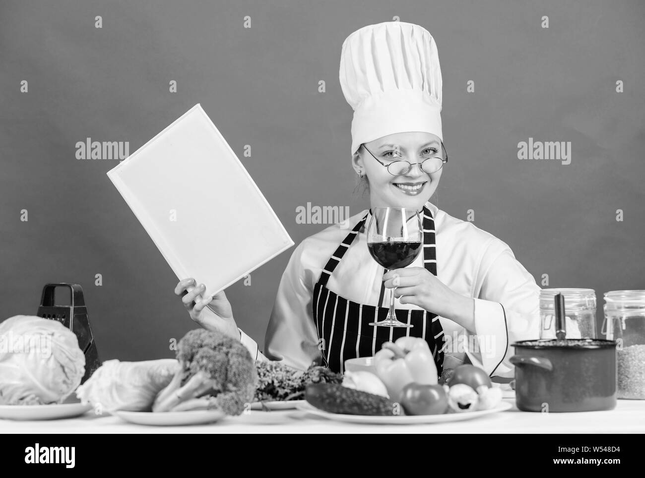 Girl read book top best culinary recipes. Traditional cuisine. Culinary ...