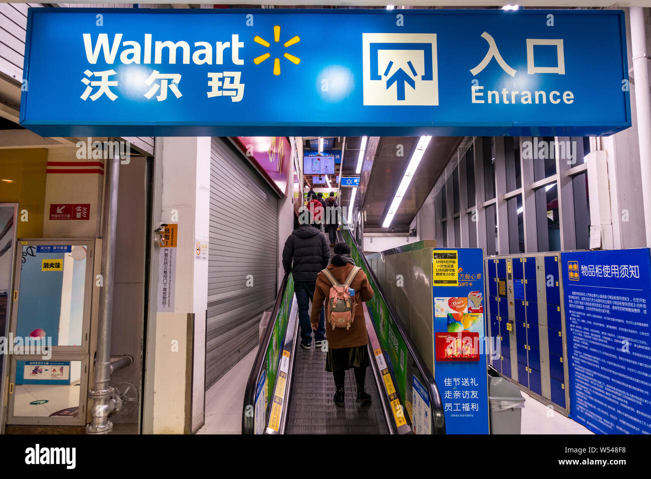 --FILE--Customers shop at a supermarket of Walmart in Shanghai, China ...