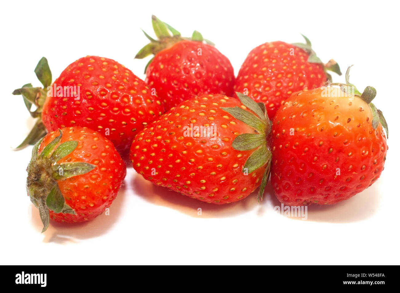 Strawberry berry slide isolated on white Stock Photo - Alamy