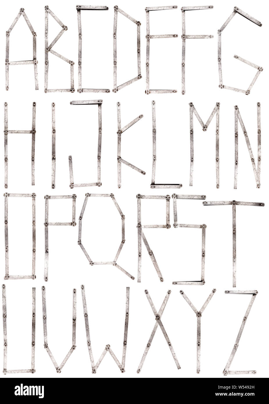Old iron meter ruler letters alphabet isolated on white background ...