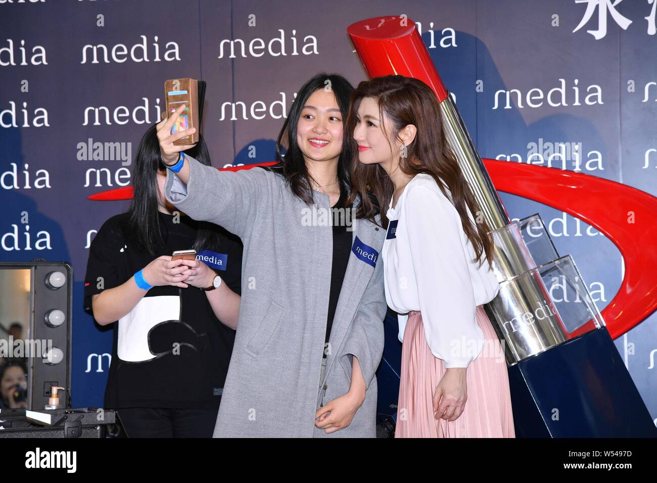 Selina of Taiwanese girls group S.H.E attends a promotional event for Kanebo Media in Hong Kong ...