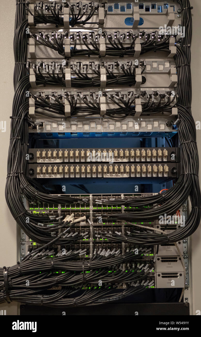 Network Switch and Ethernet Cables Patched into Local Network and IPTV ...