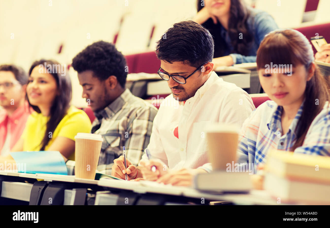 Multiethnic students writing test hi-res stock photography and images ...