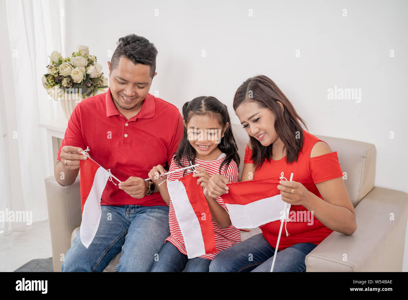 parent with daughter preparing and make their own indonesian flag Stock ...