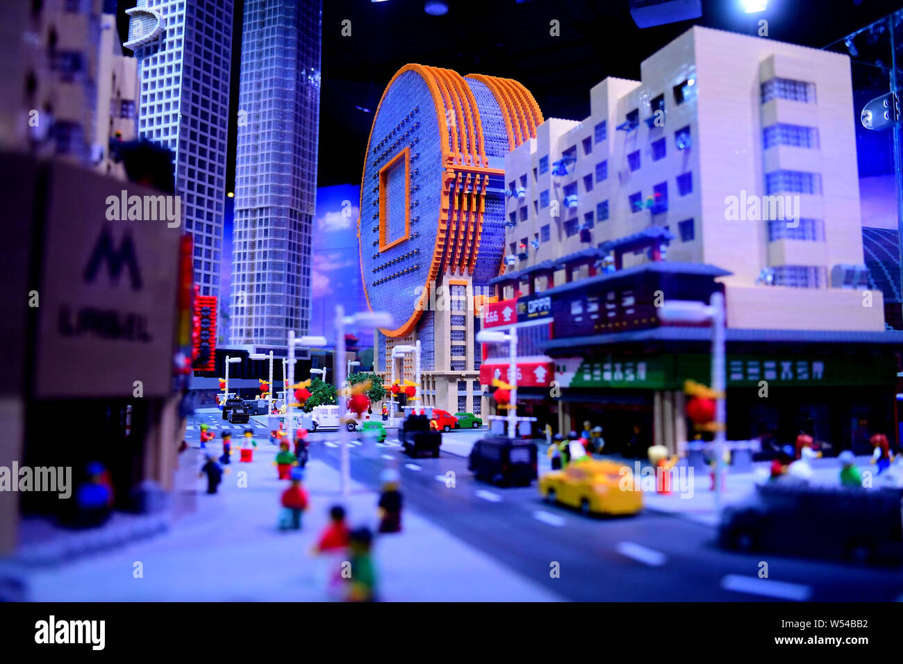 The Coin-shaped Fang Yuan Building made by Lego bricks is on display at ...