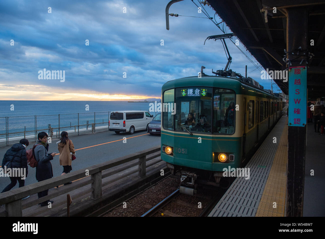 A train on the Enoden Line enters the Kamakura-Koko-Mae Station by the ...