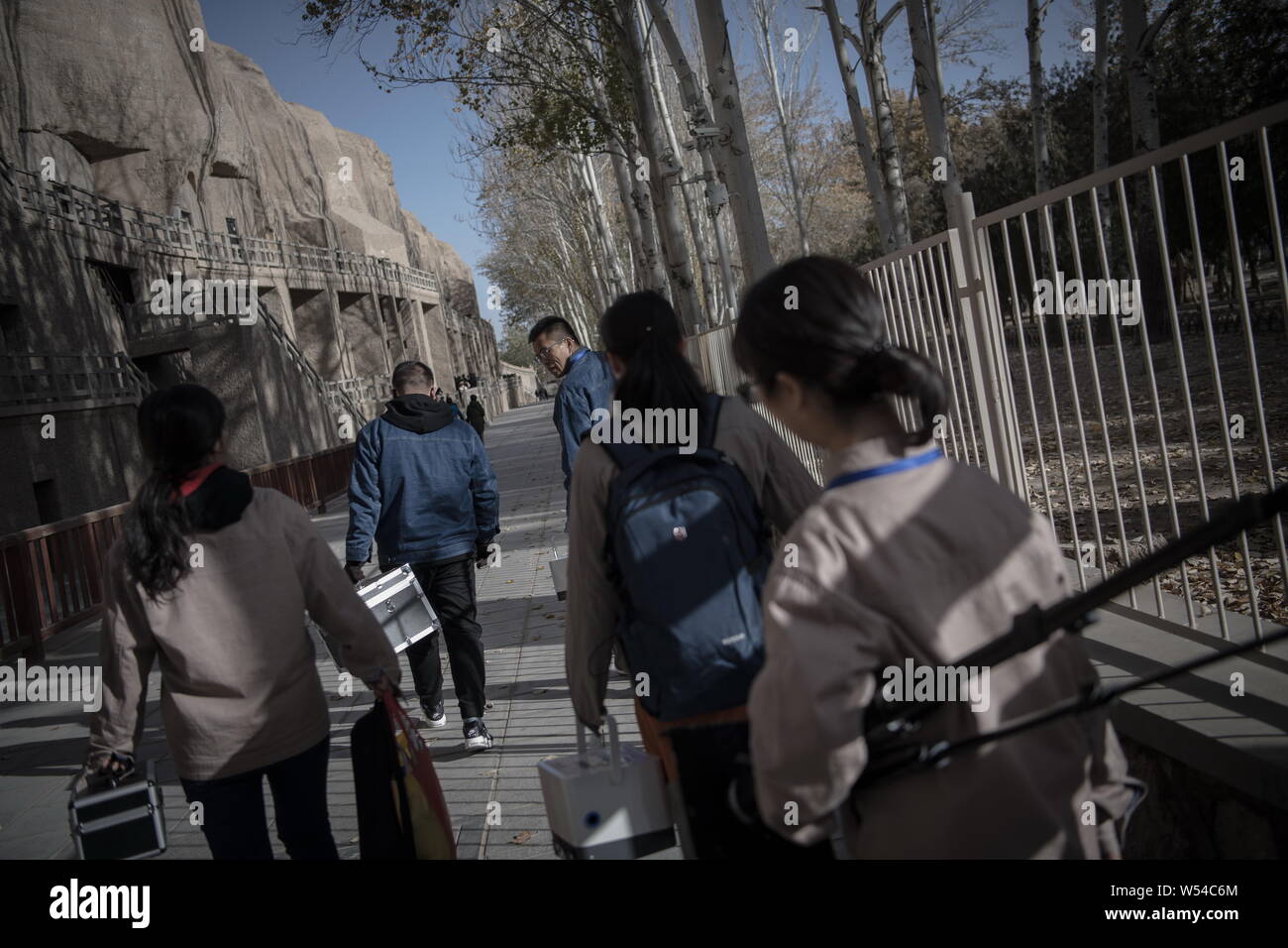Chinese researcher Wu Fasi and his teammates from Dunhuang Academy ...