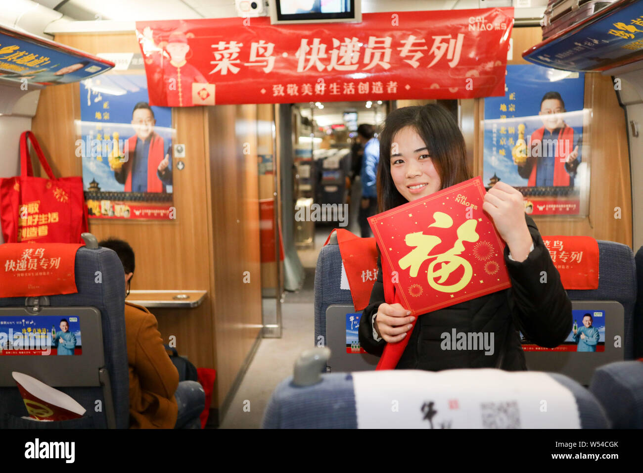 Chinese couriers pose with the Chinese character "Fu", meaning "Luck ...