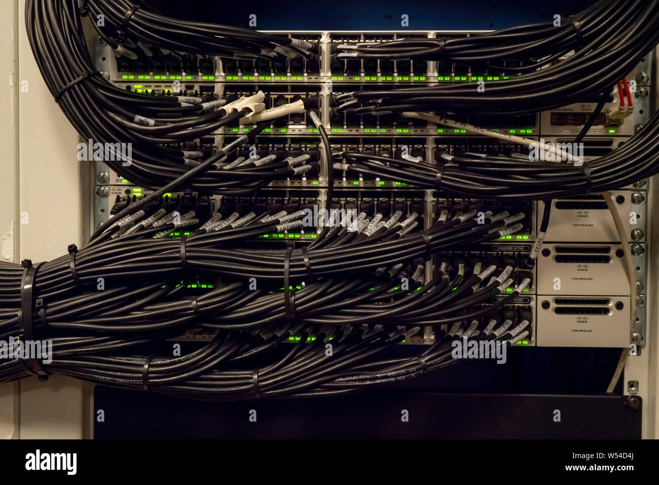 Network Switch and Ethernet Cables Patched into Local Network and IPTV ...