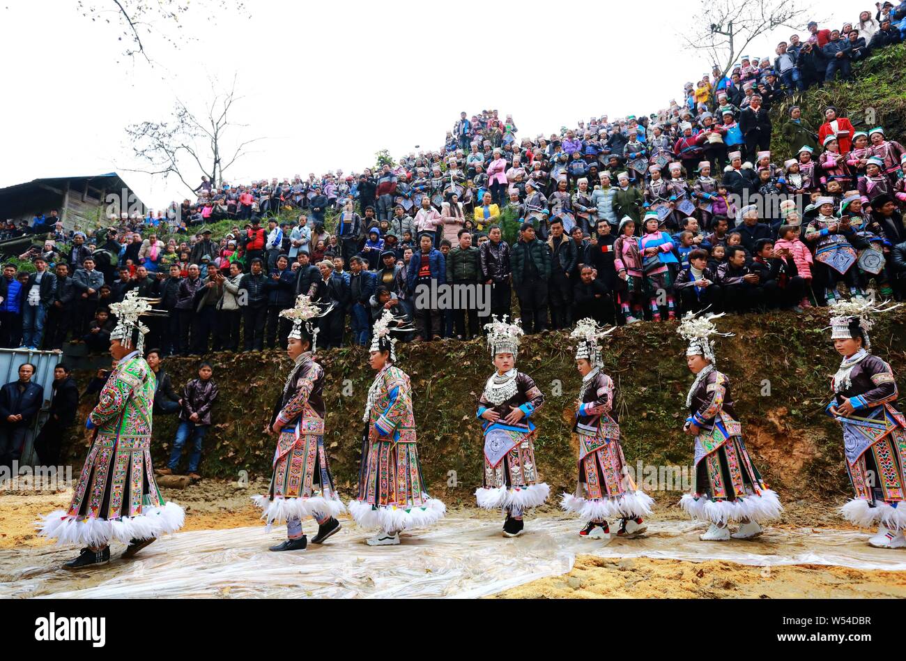 Chinese people of Miao ethnic minority dressed in traditional costumes ...