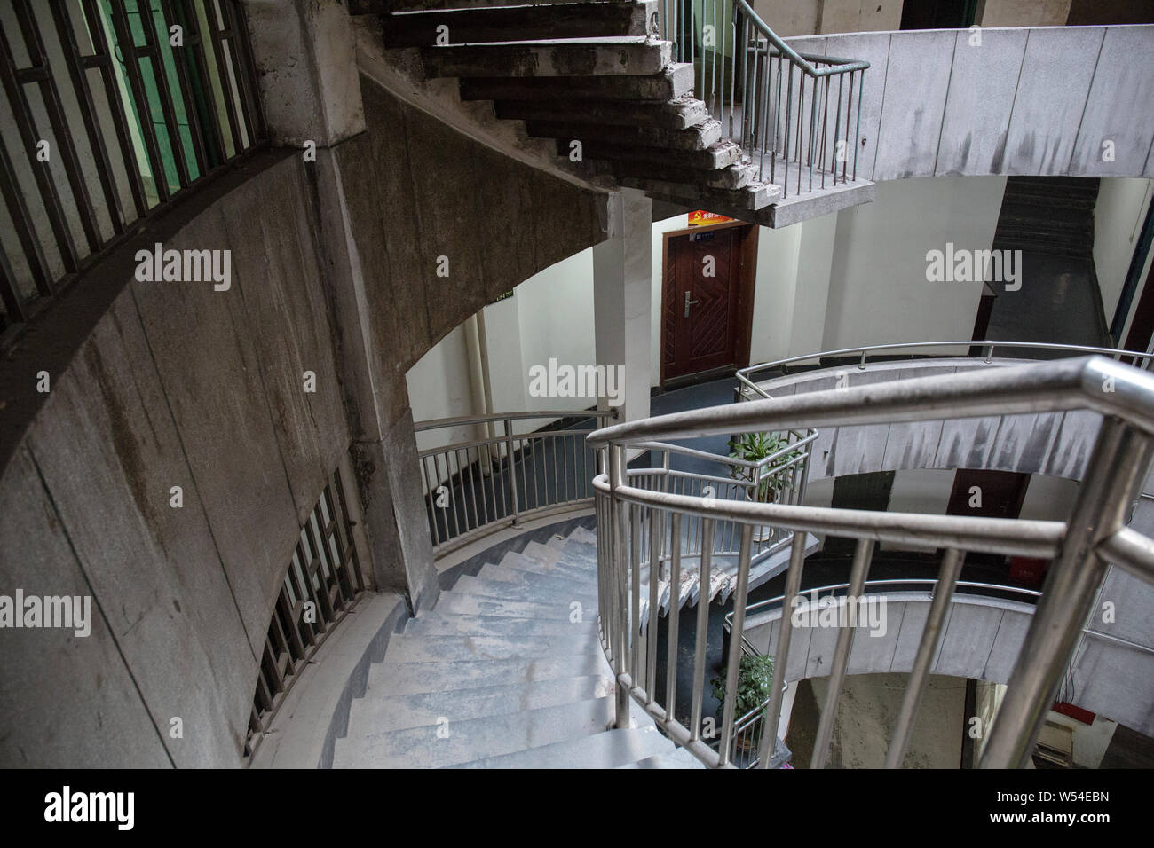 Interior view of a nine-storey cylinder building at a bus station in ...