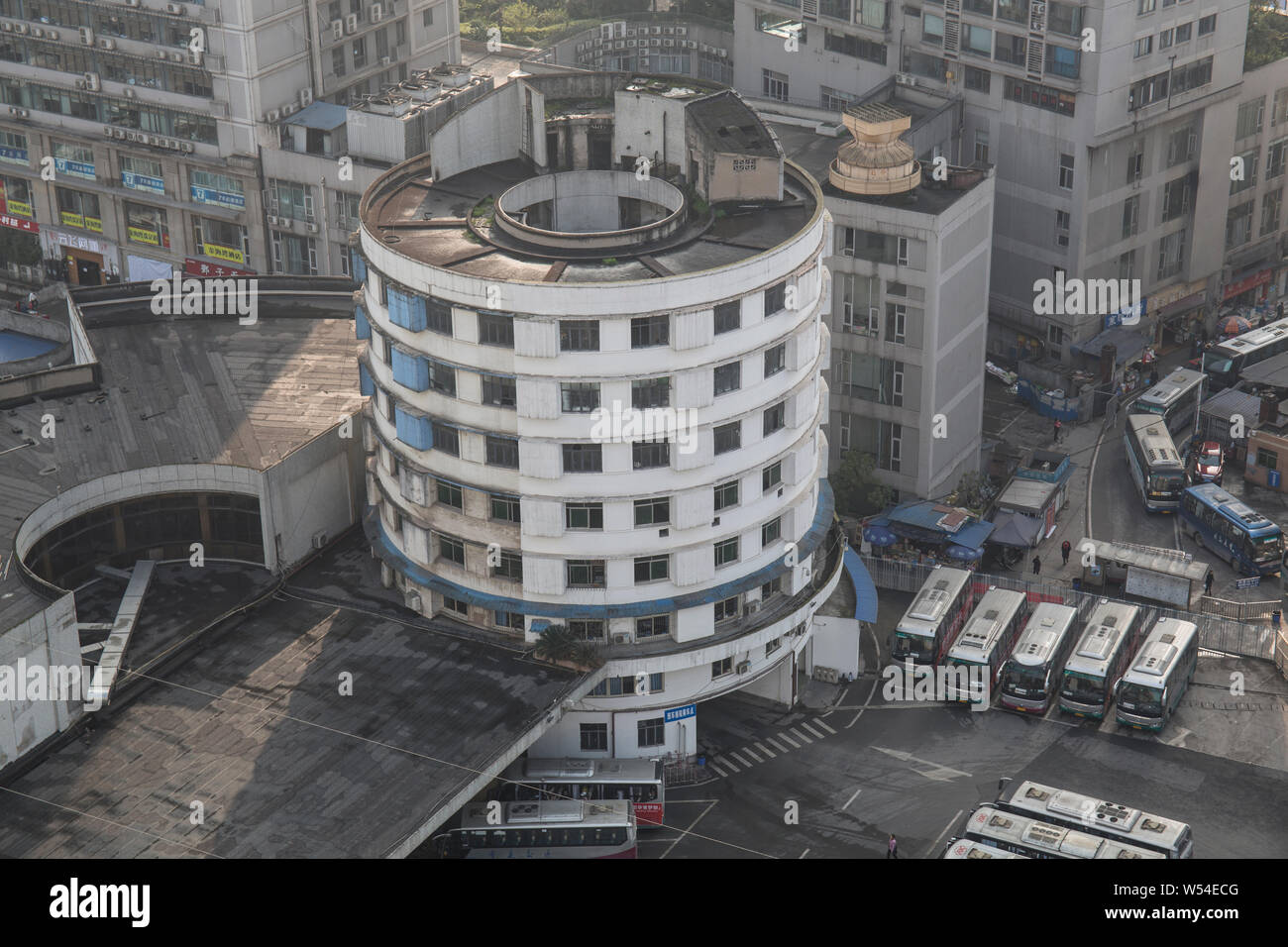 A view of a nine-storey cylinder building at a bus station in Jiangbei ...