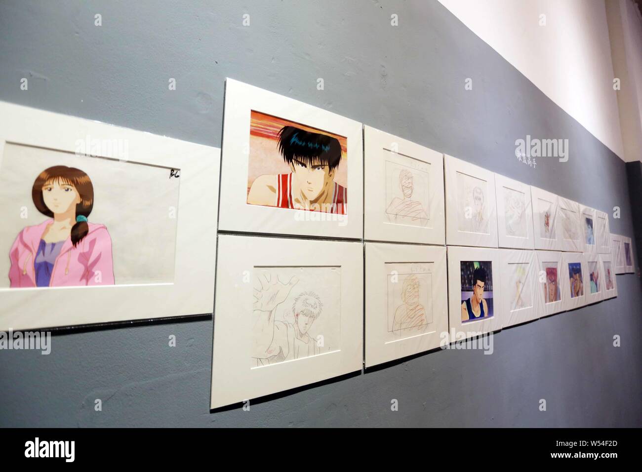 Manuscripts of Japanese manga series Slam Dunk are on display during a ...