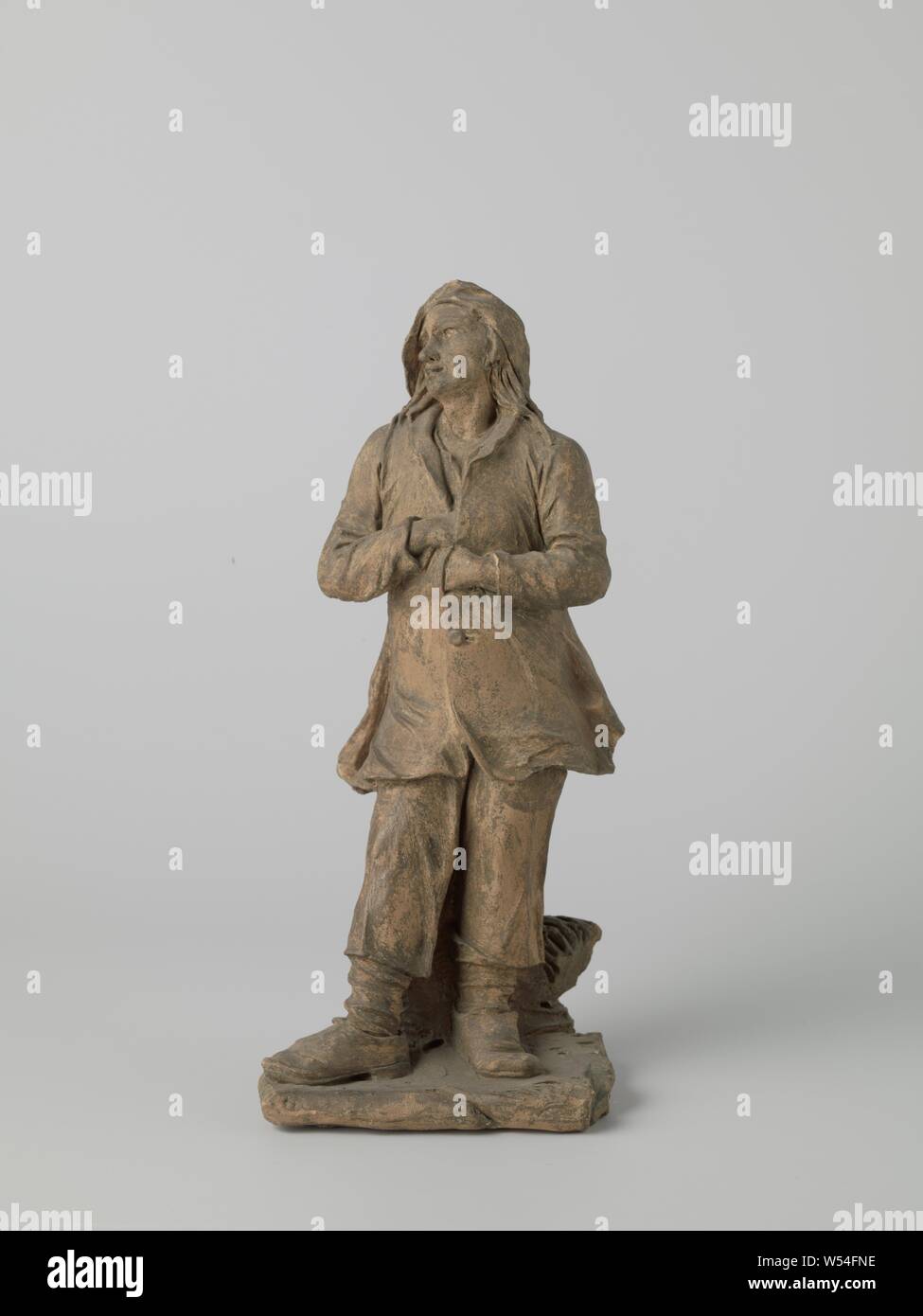 Tramp, Man on a rectangular plot with the right leg forward and the ...