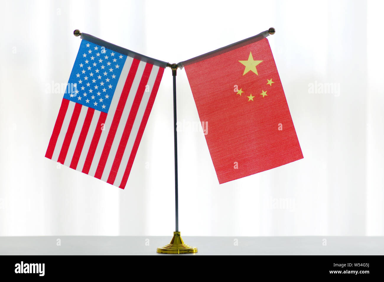 --FILE--National flags of China and the United States are seen in Ji ...