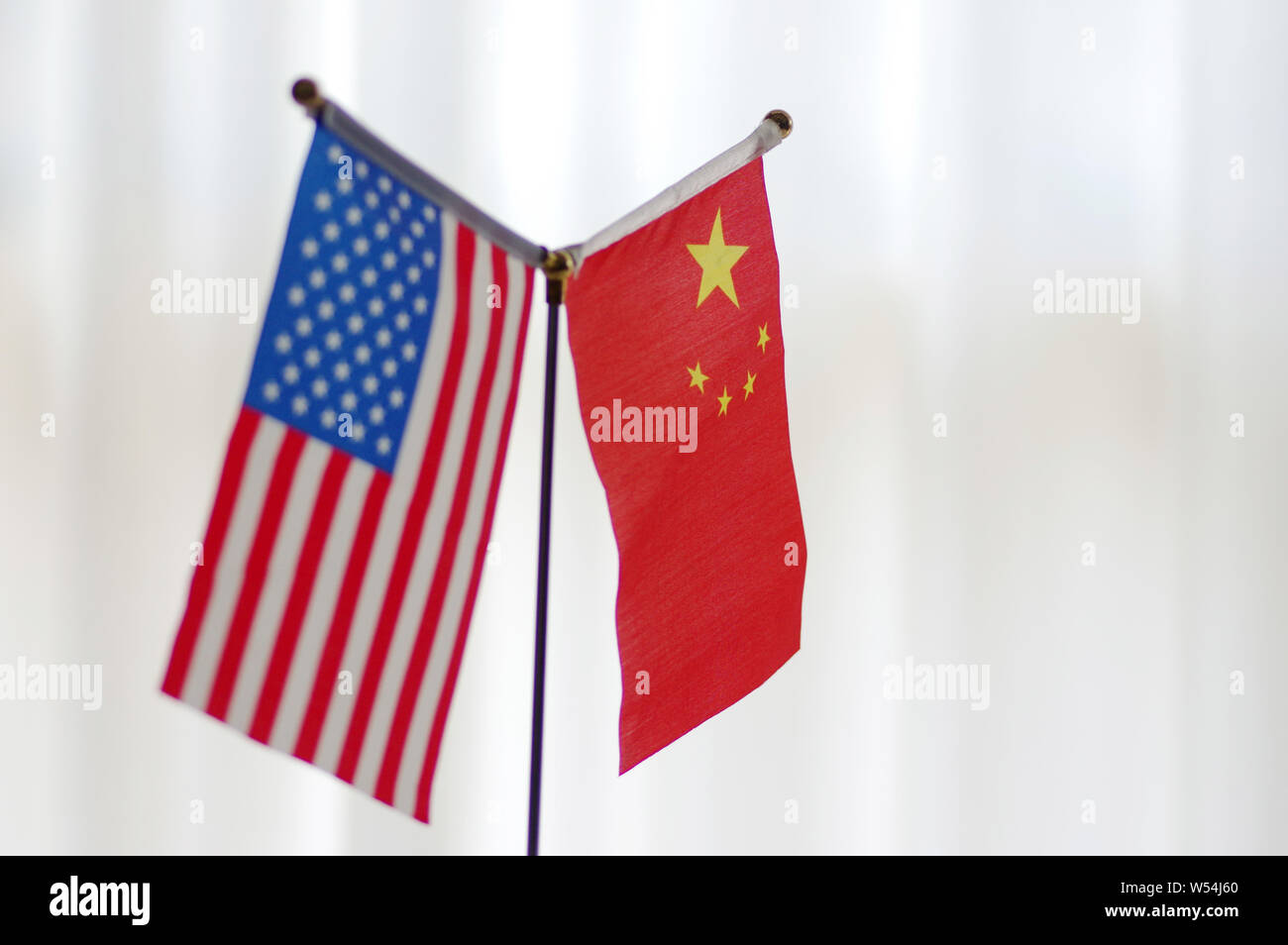--FILE--National flags of China and the United States are seen in Ji ...