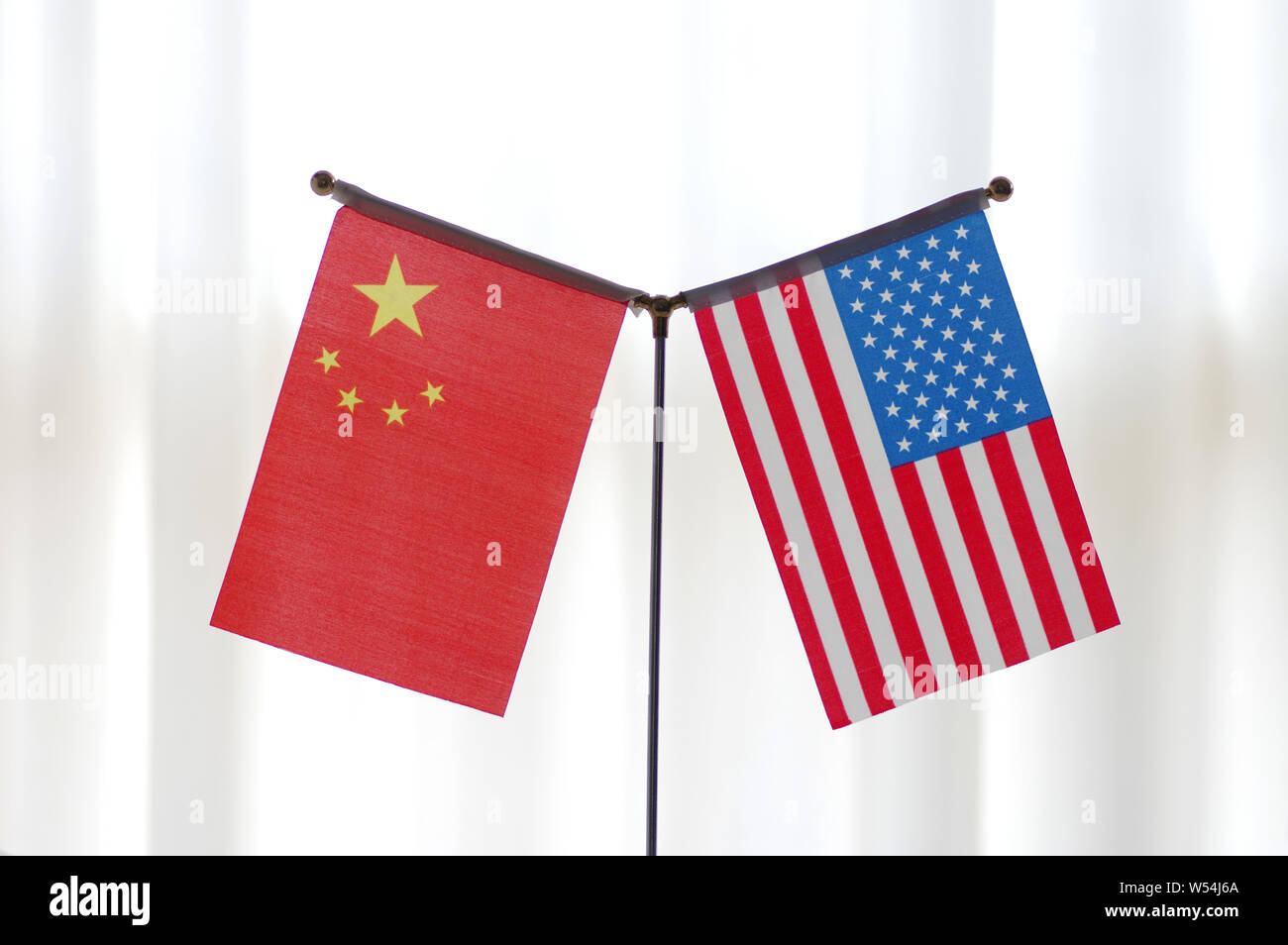 --FILE--National flags of China and the United States are seen in Ji ...