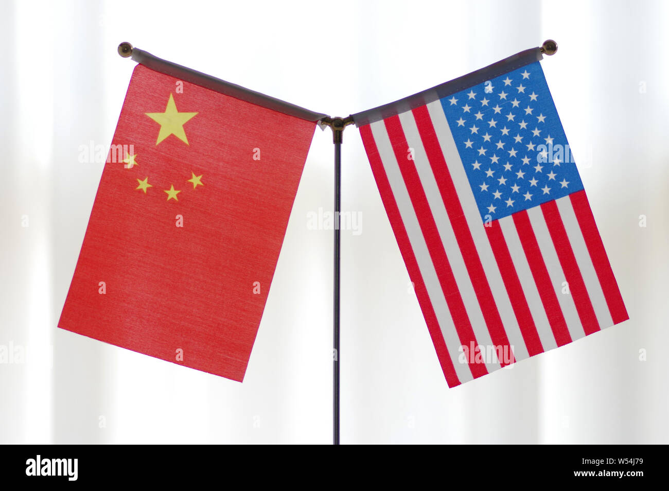 --FILE--National flags of China and the United States are seen in Ji ...