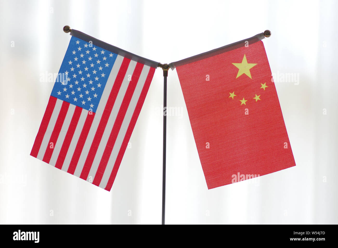 --FILE--National flags of China and the United States are seen in Ji ...