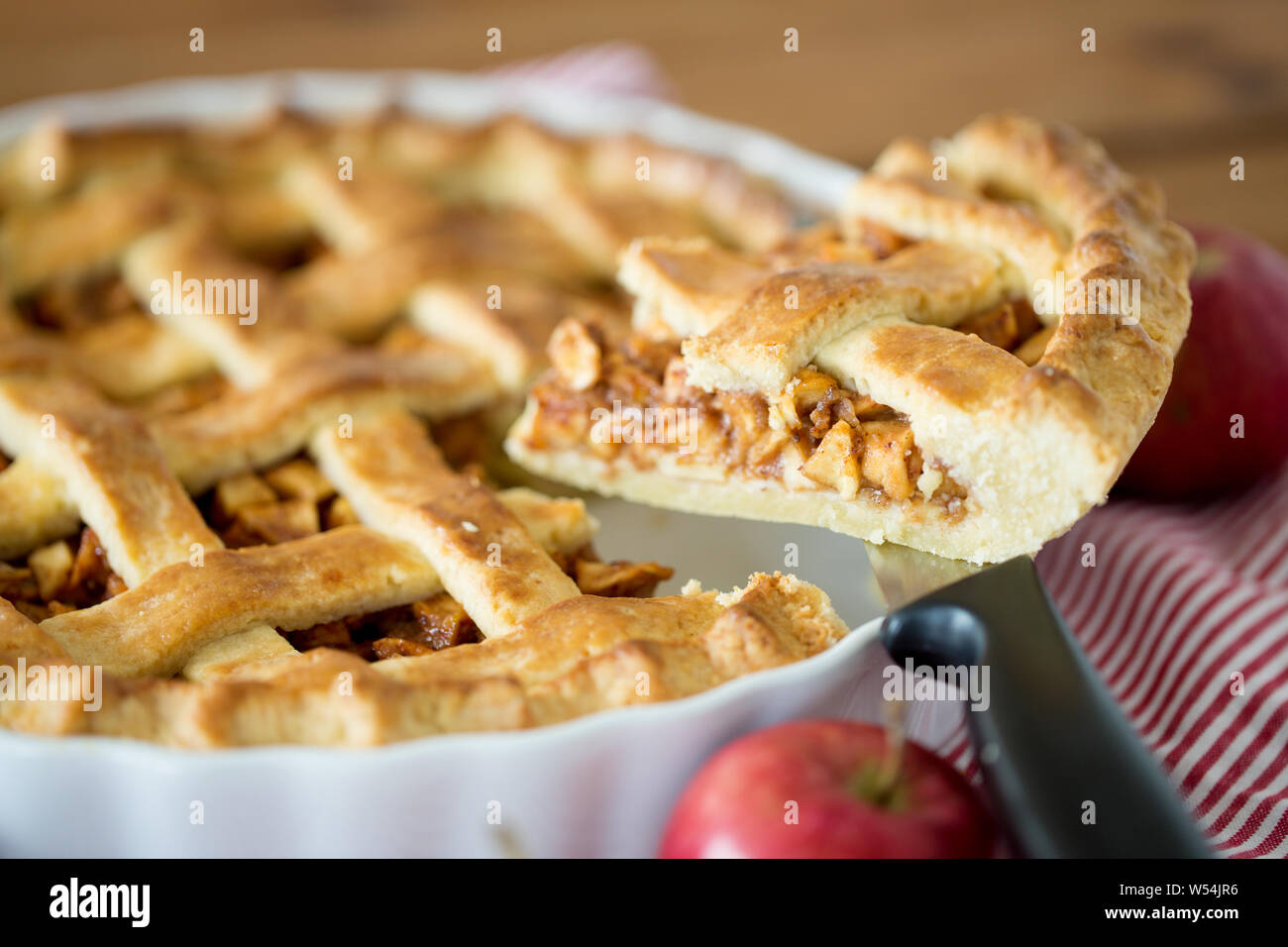 close up of apple pie piece on kitchen knife Stock Photo - Alamy