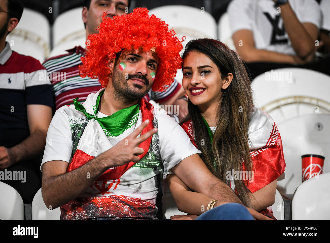 Iran fans wave slogans and national flags to show support to Iran ...