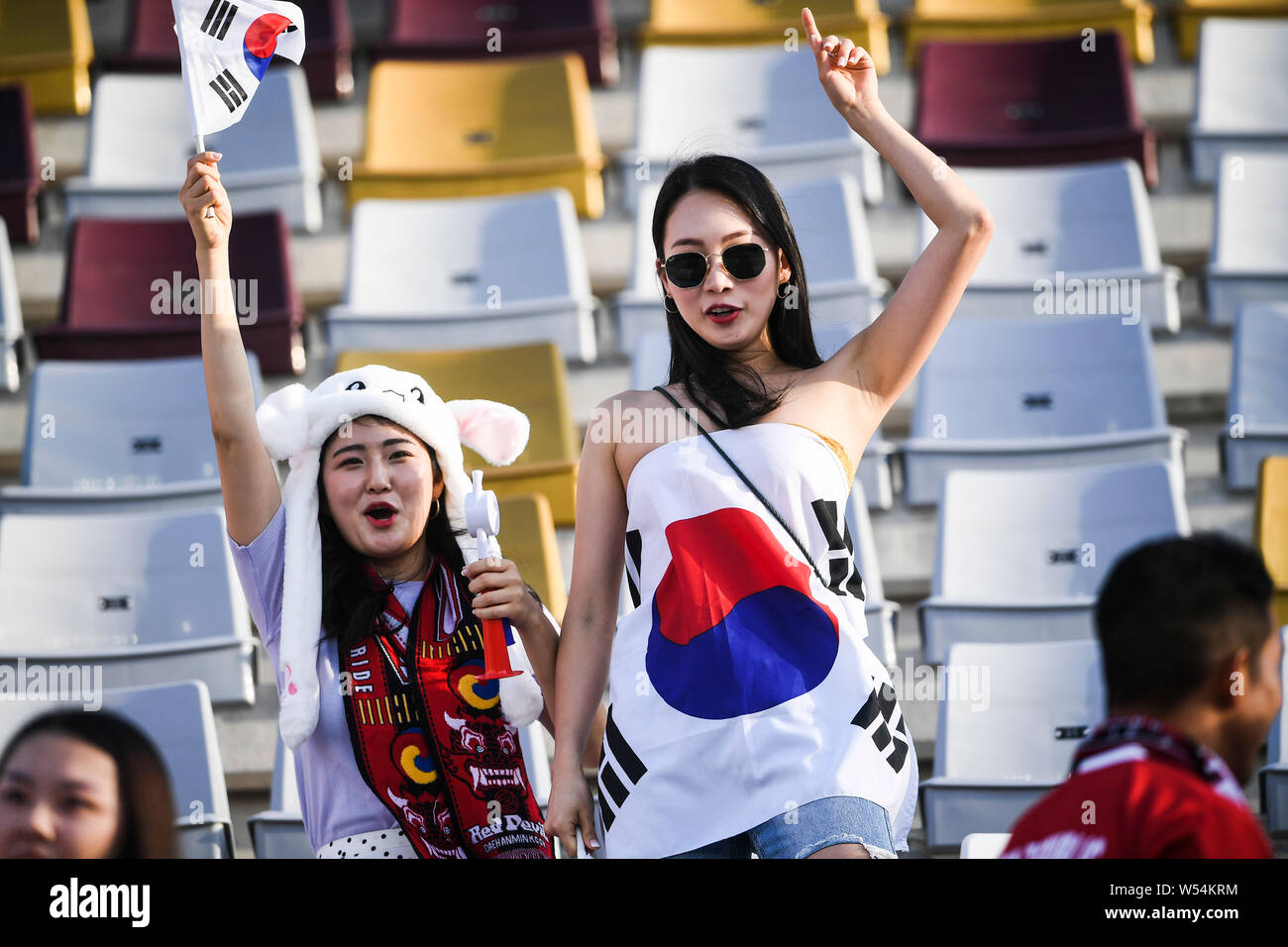 A South Korean football fan wearing the national flag shows support for ...
