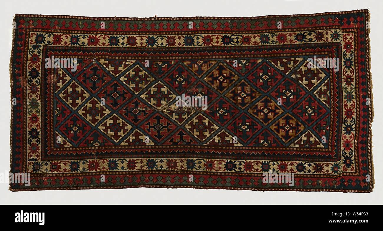 Eastern carpet, the midfield of which is decorated with diagonal colors ...