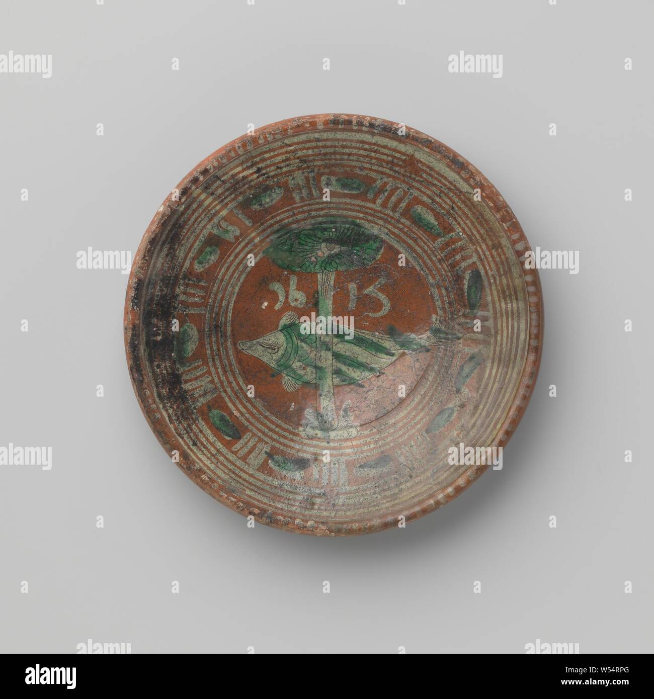 Plate made of lead glaze, Round plate made of lead glaze. The flat is ...