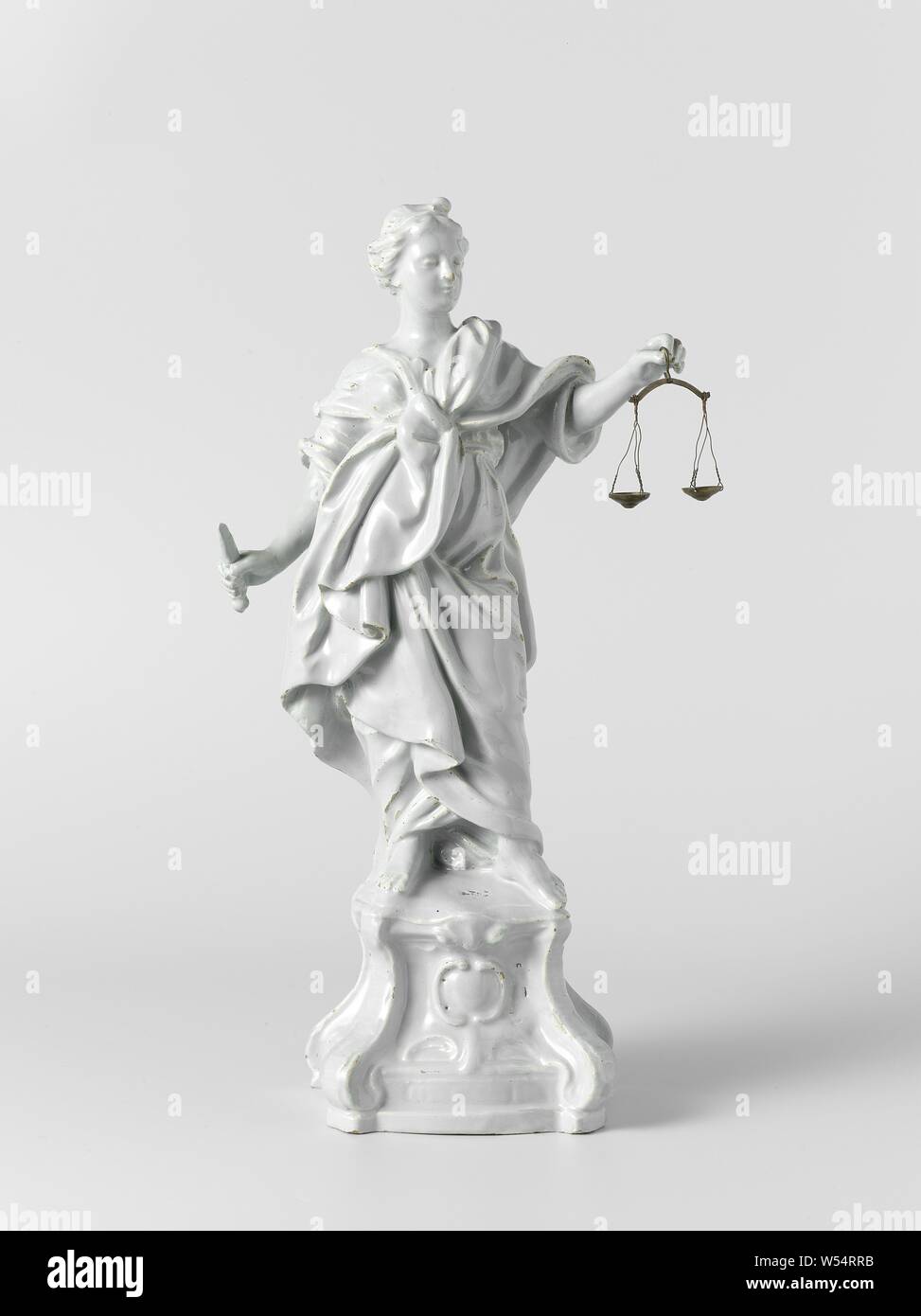 Justitia, faience female figure, representing Justitia. Glazed white ...