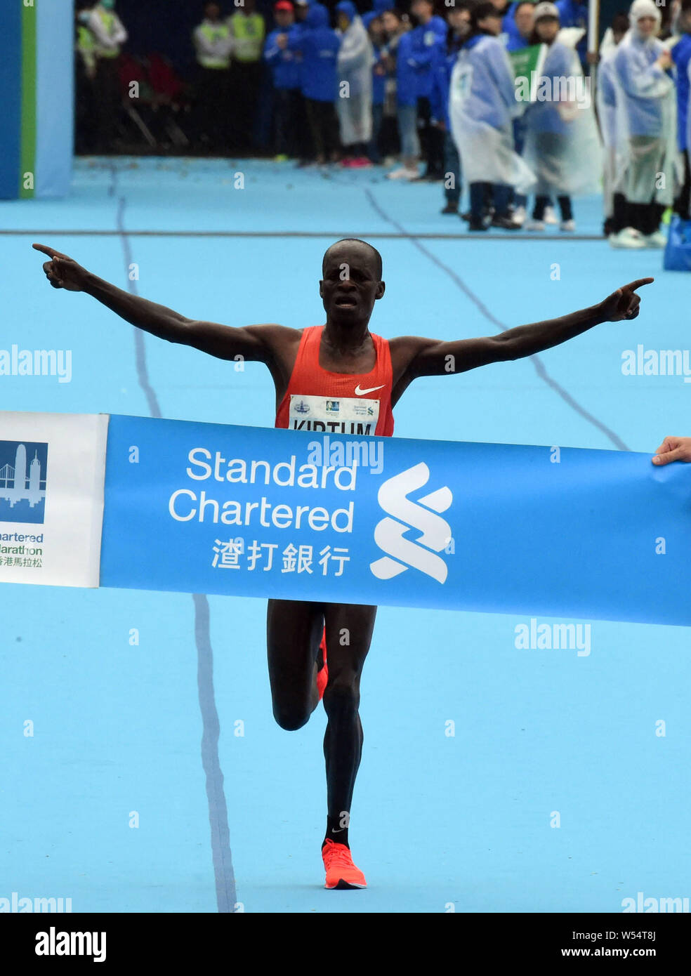 Barnabus Kiptum from Kenya reaches the finish line of the men's ...