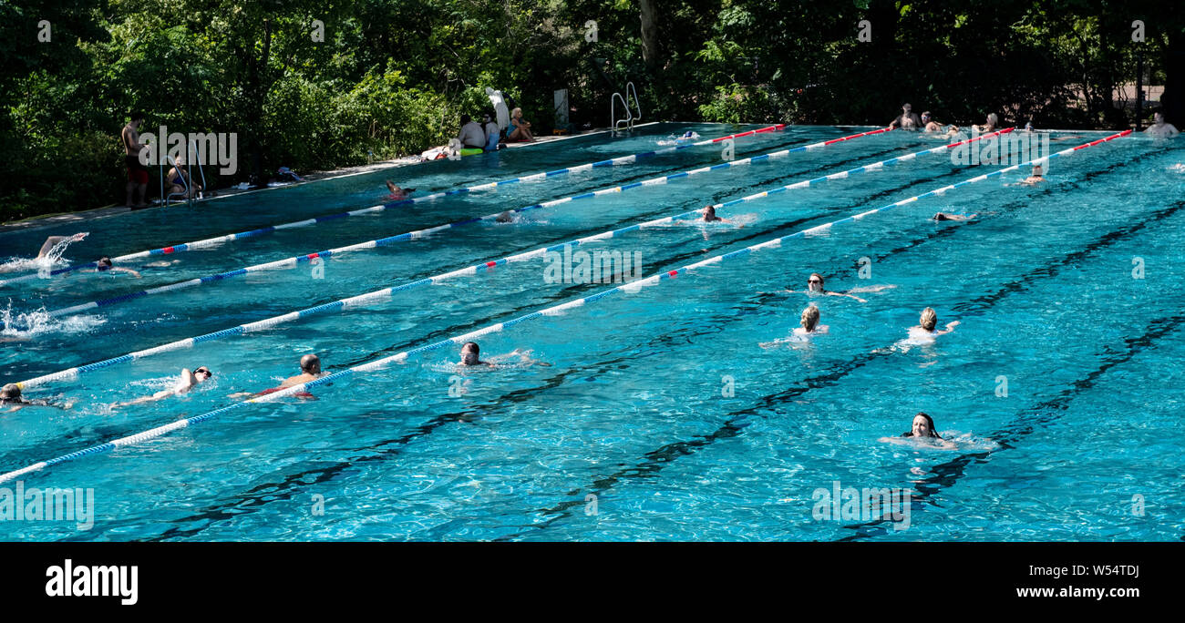 Berlin, Germany. 26th July, 2019. Sporty bathers take their lanes in ...