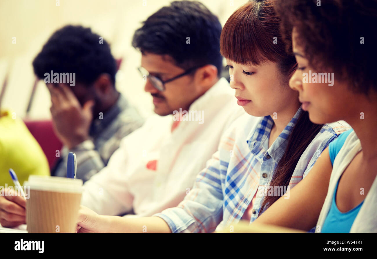 Multiethnic students writing test hi-res stock photography and images ...