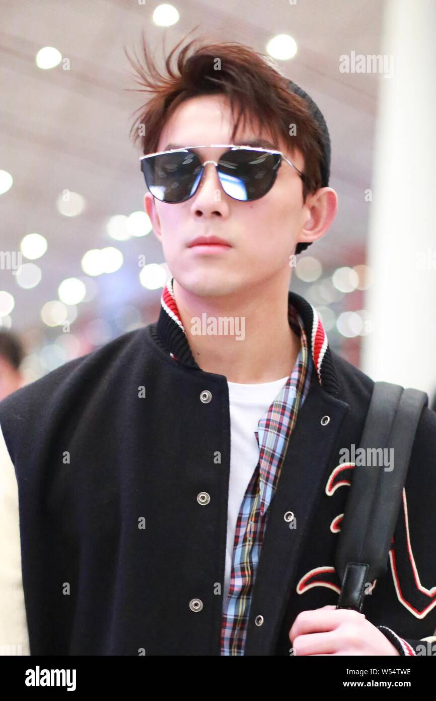 Chinese actor Wu Lei arrives at the Beijing Capital International ...