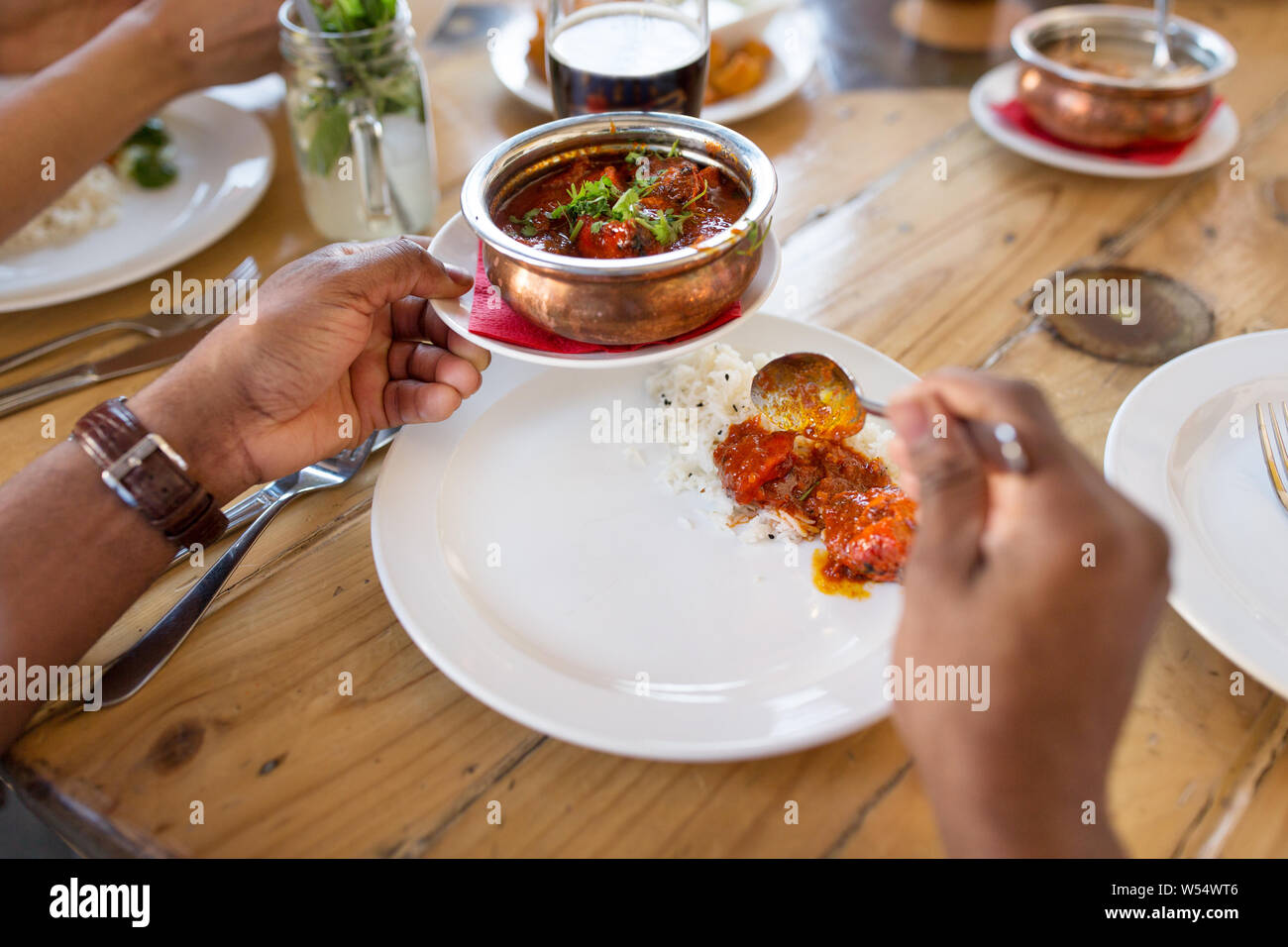 African person eating meat hi-res stock photography and images - Alamy