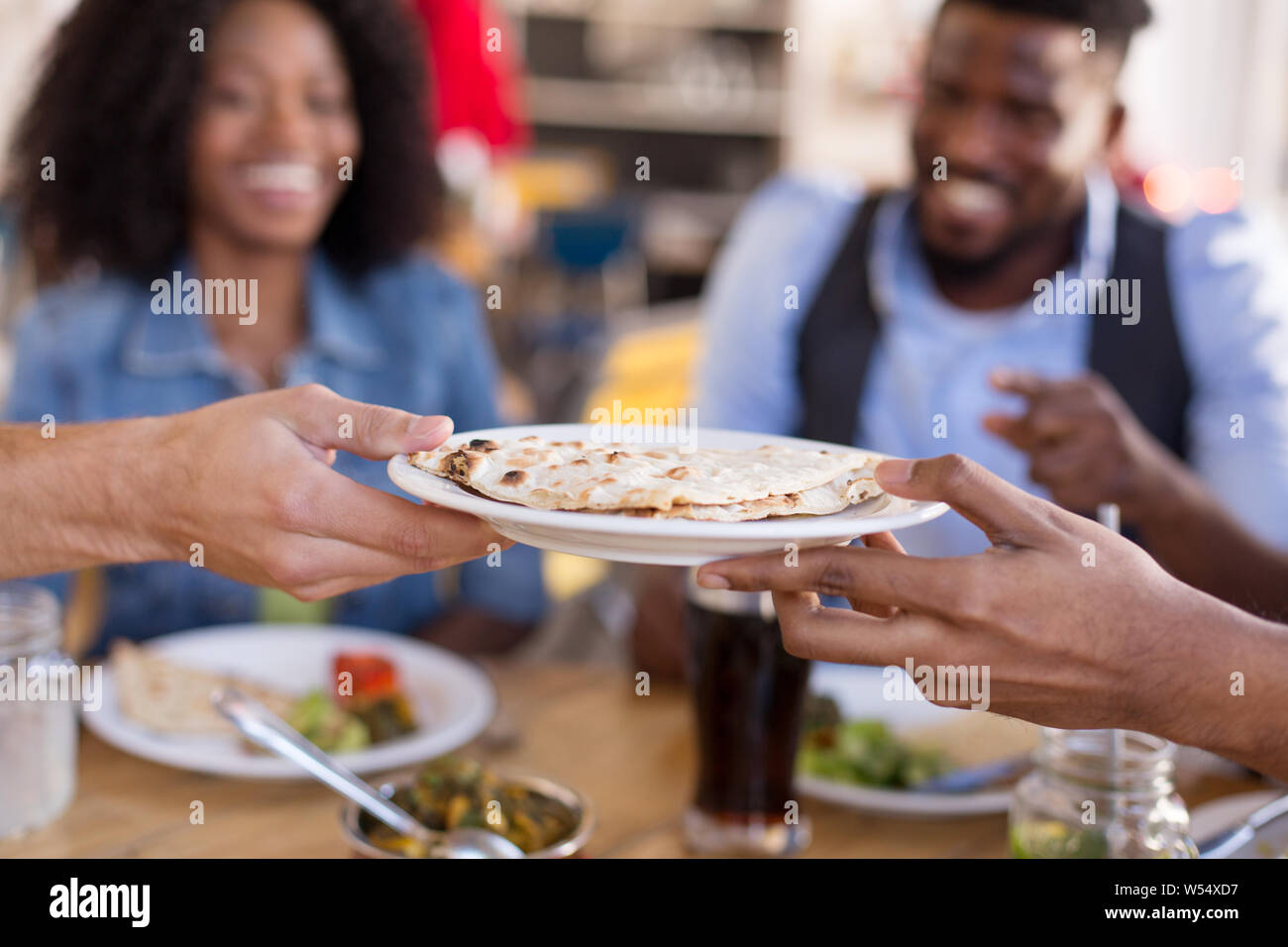 Indian sharing bread hi-res stock photography and images - Alamy