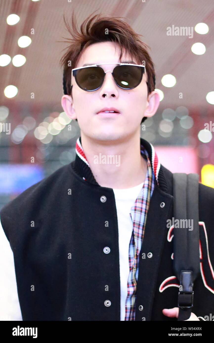 Chinese actor Wu Lei arrives at the Beijing Capital International ...