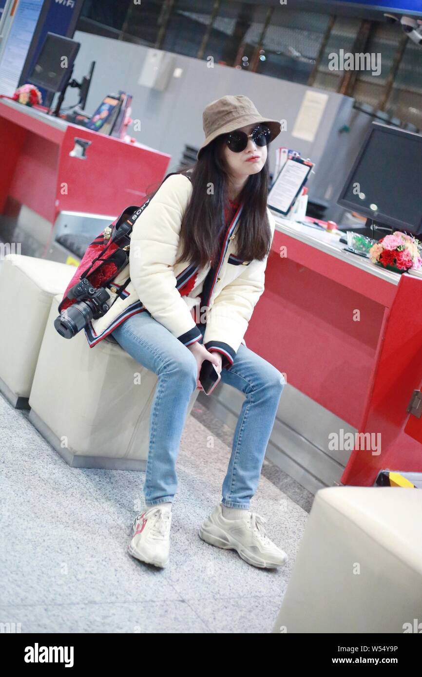 Chinese actress Ni Ni arrives at the Beijing Capital International ...