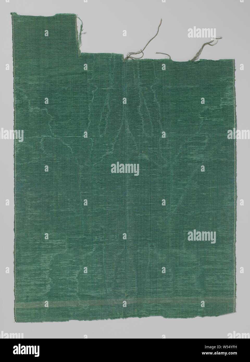 Fragment silk, with a symmetrical watered pattern in emerald green ...
