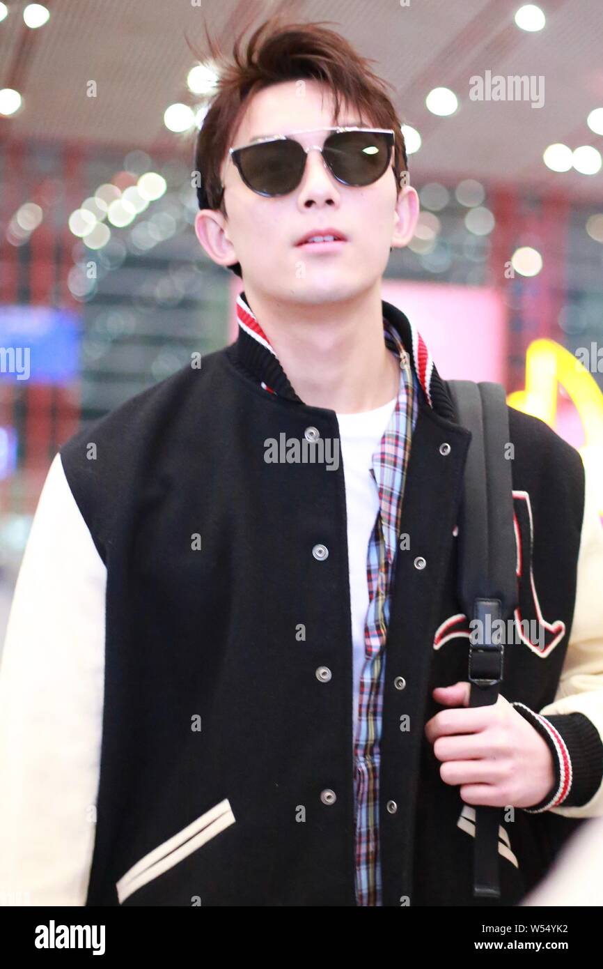 Chinese actor Wu Lei arrives at the Beijing Capital International ...