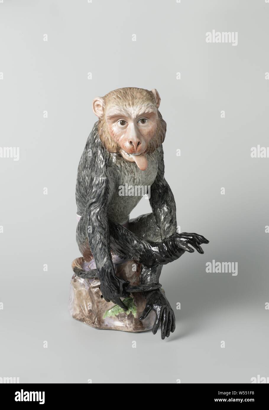 Monkey, Figure of painted porcelain. The figure represents a gray-black ...