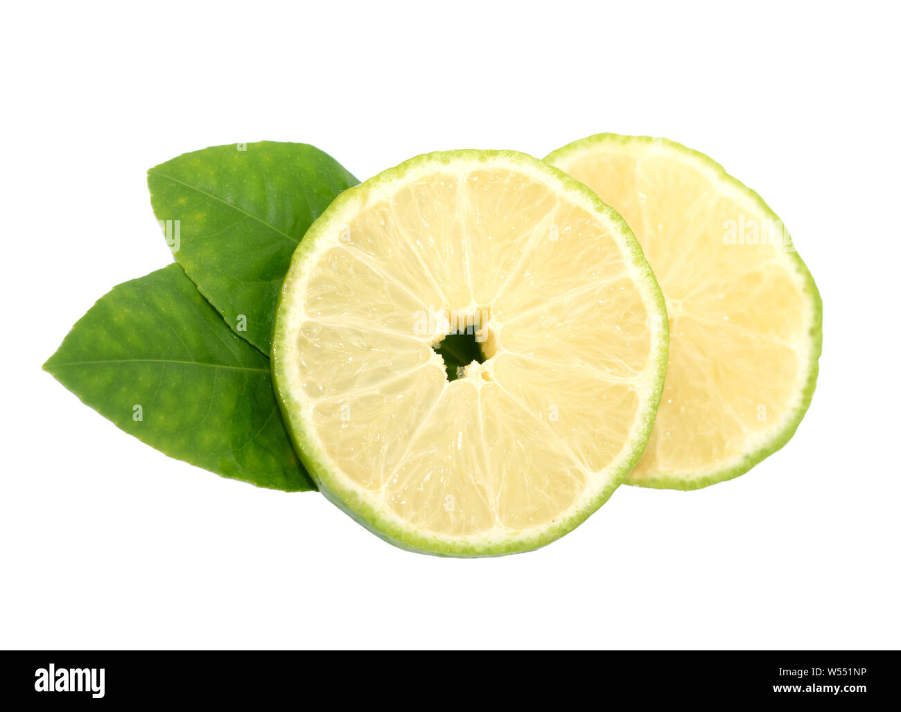 Chopped lime and leaves isolate on white Stock Photo - Alamy