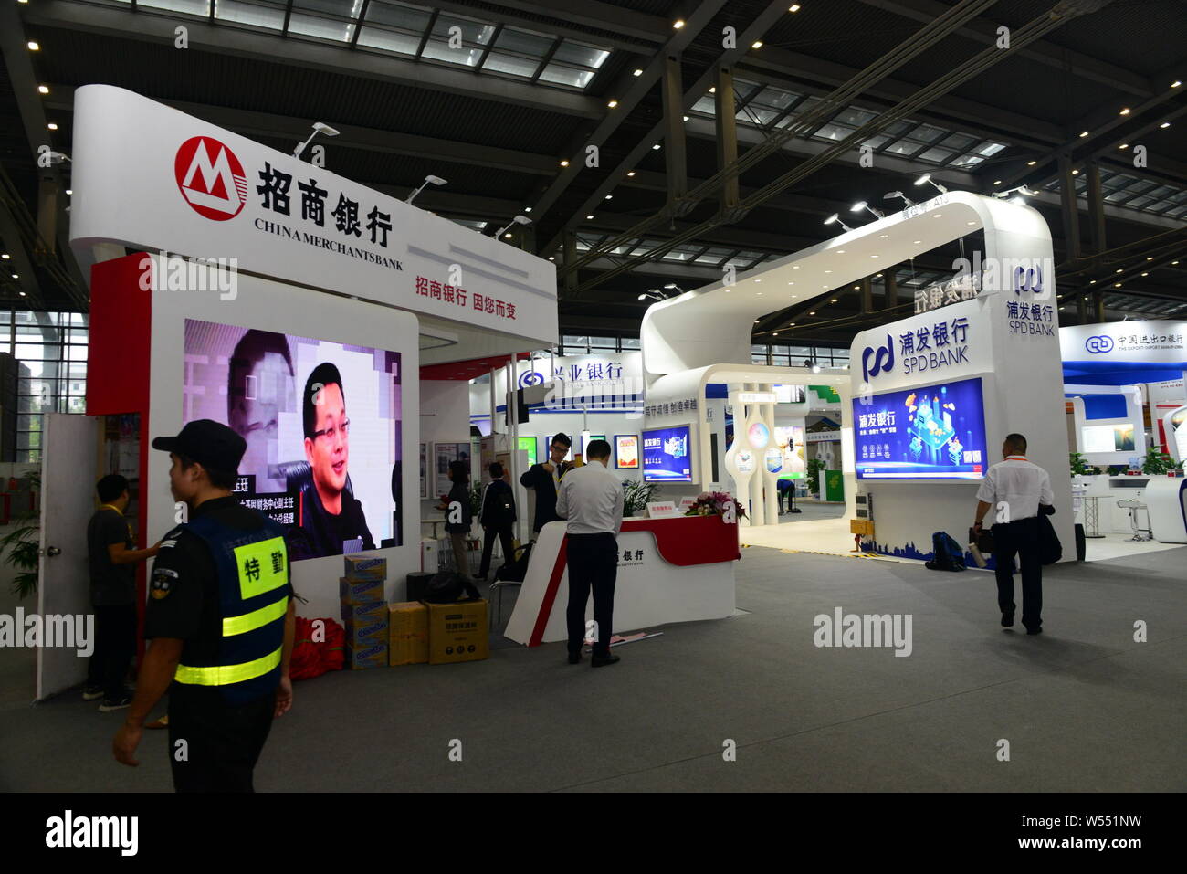 --FILE--People visit the stand of China Merchants Bank (CMB) during an ...