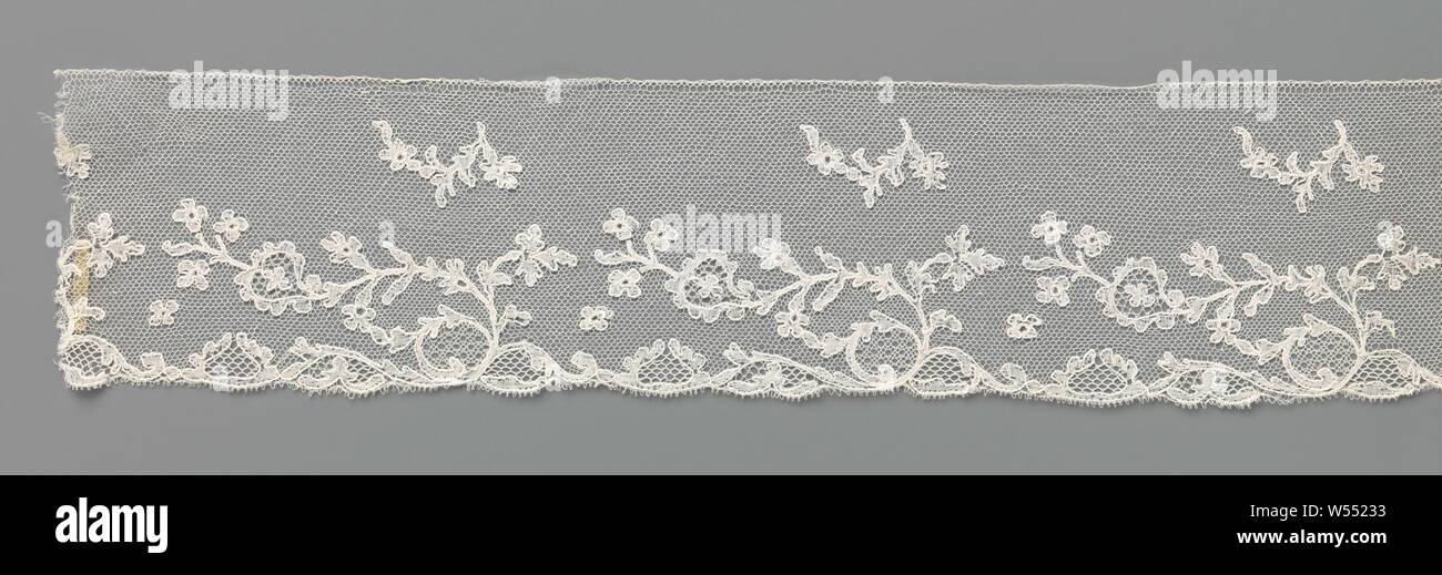 Strip of bobbin lace with c-shaped branches with heart-shaped flower ...