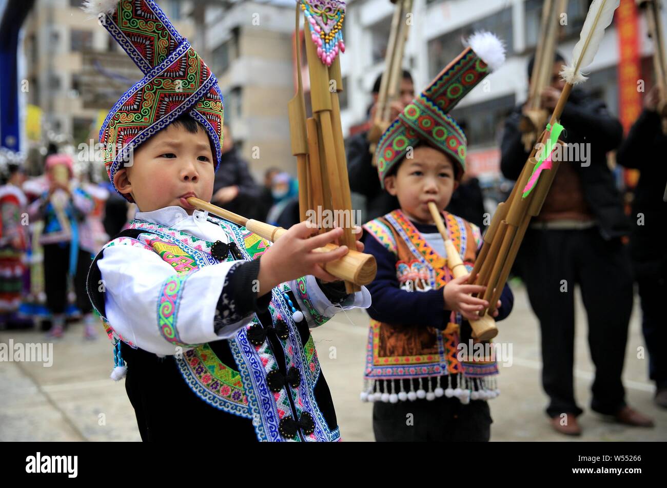 Chinese people of Miao ethnic group dressed in traditional costumes ...