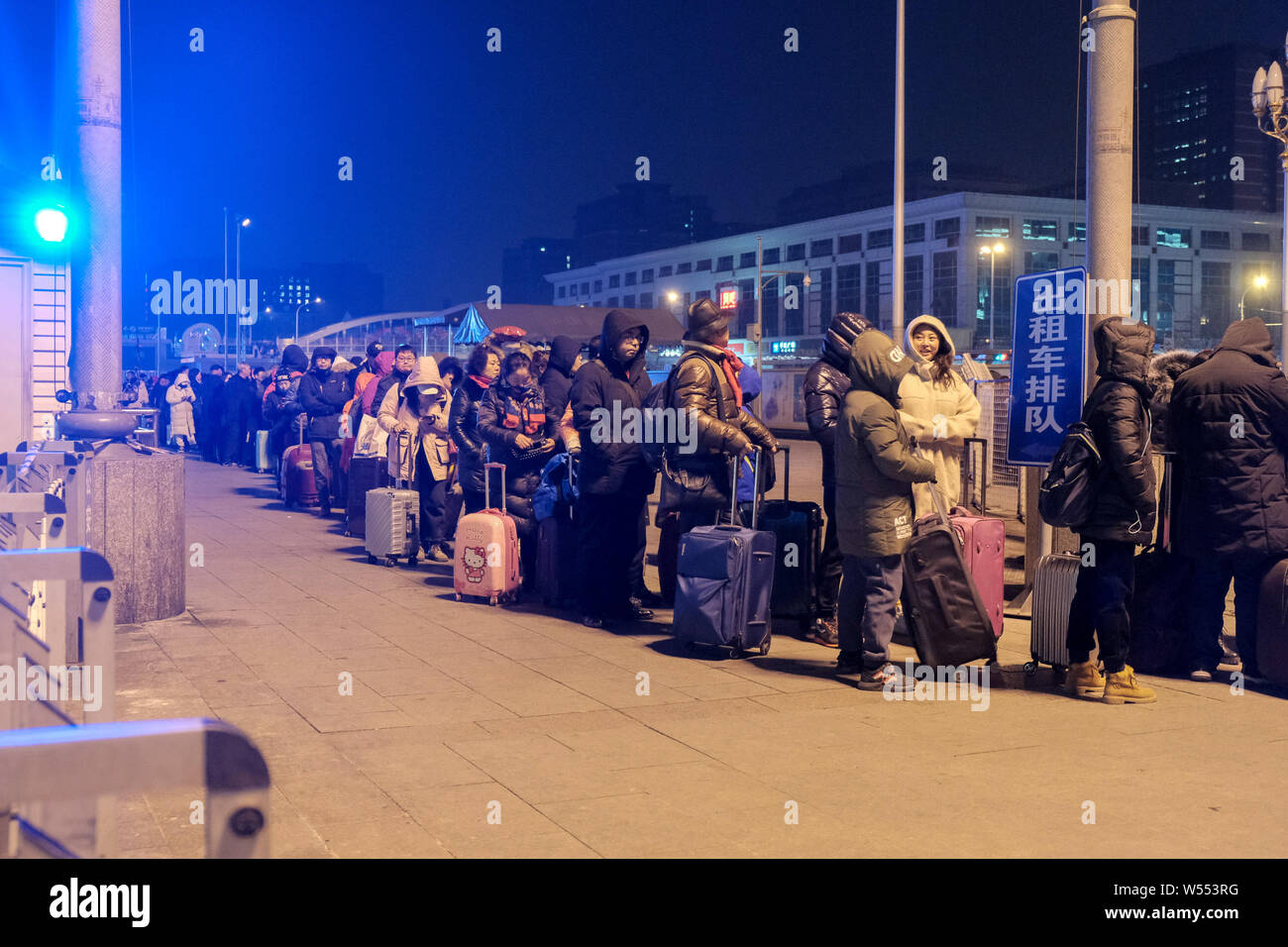 Chinese passengers who return to work from the Chinese Lunar New Year ...